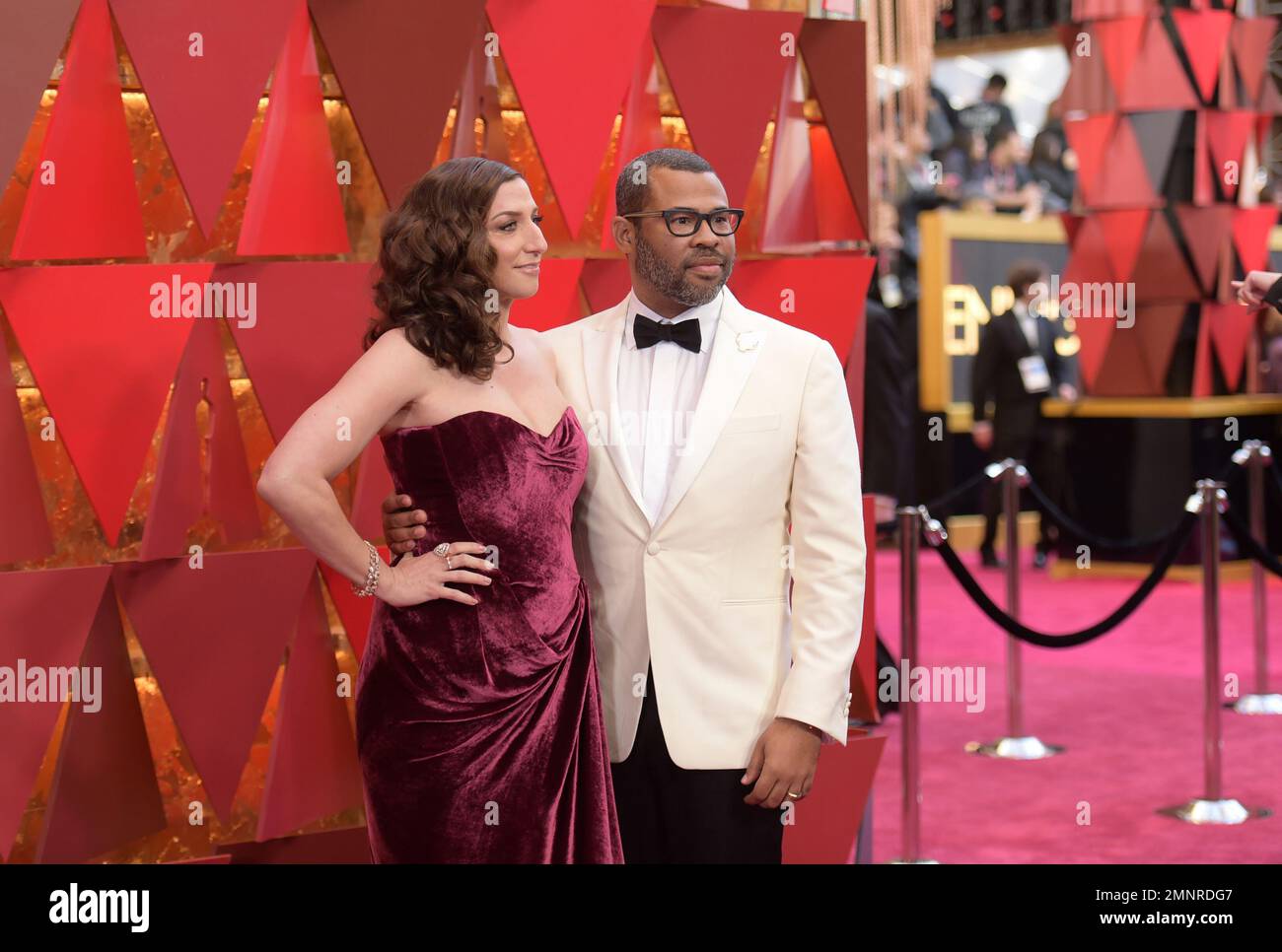 Chelsea Peretti, left, and Jordan Peele arrive at the Oscars on Sunday ...
