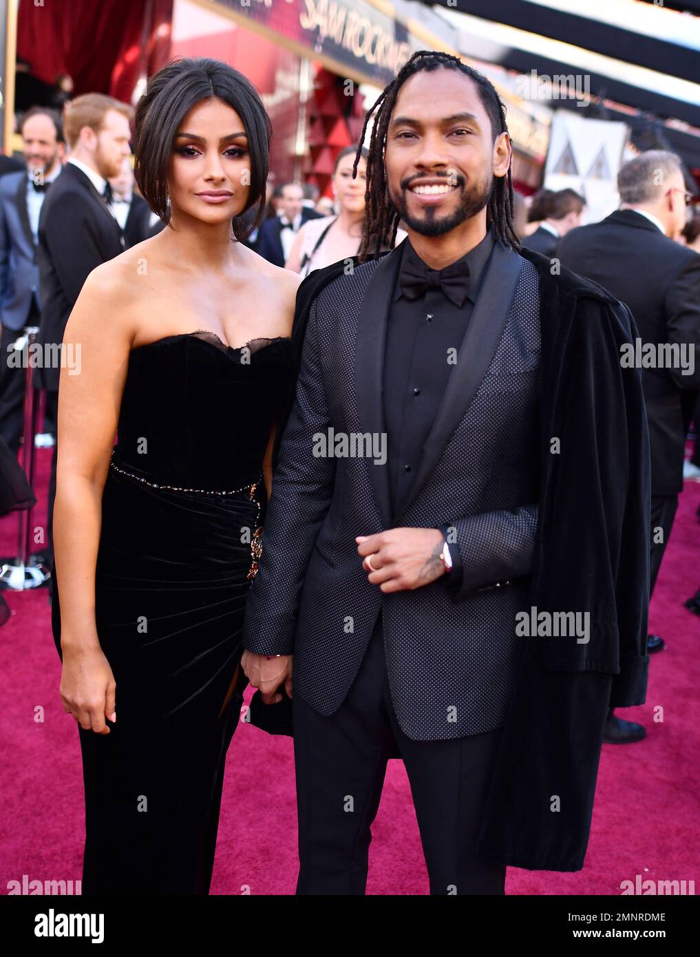 Nazanin Mandi, left, and Miguel arrive at the Oscars on Sunday, March 4 ...