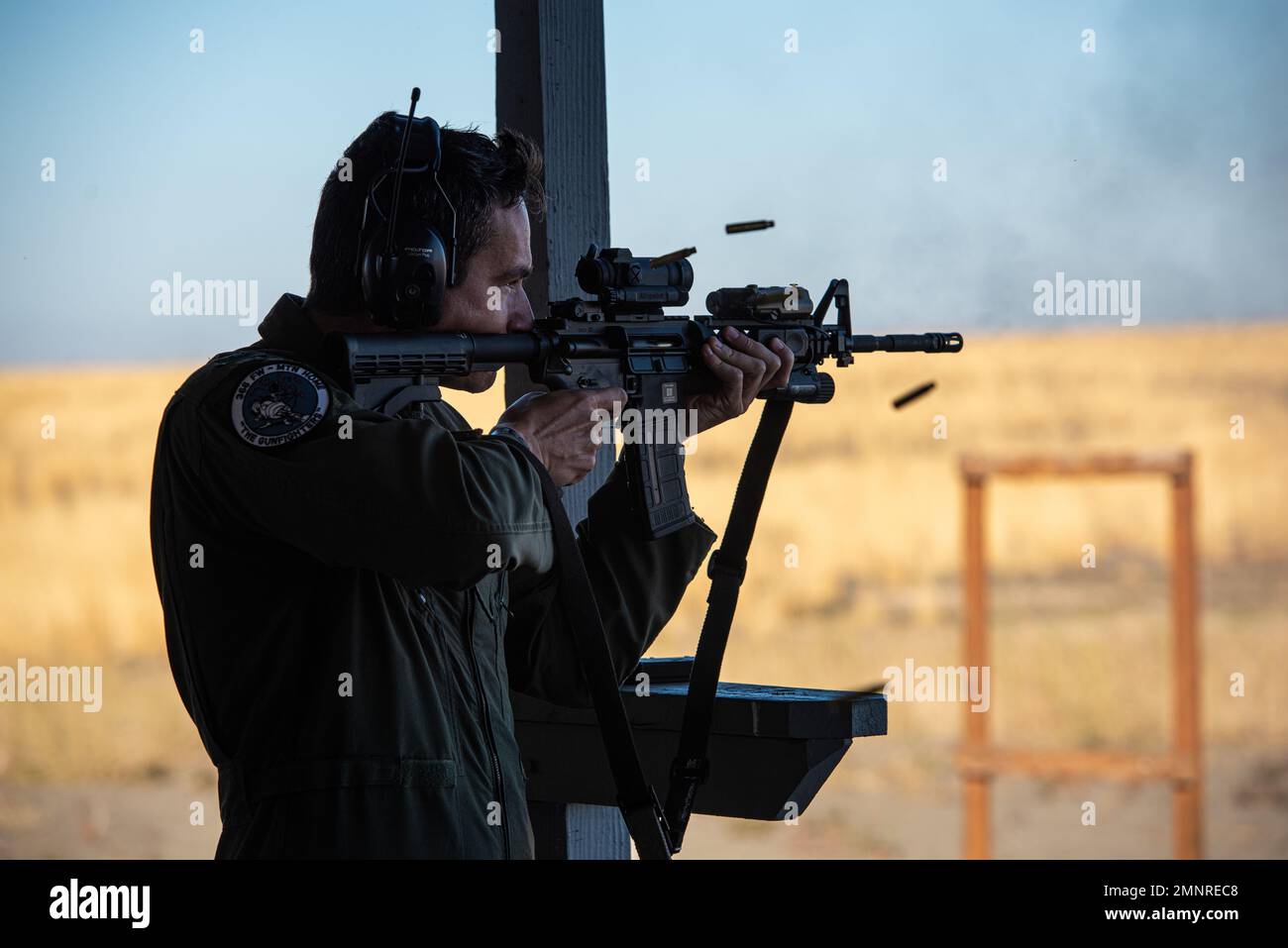 Col. Isaac T. Bell, 366th Fighter Wing Deputy commander, fires a M4 ...