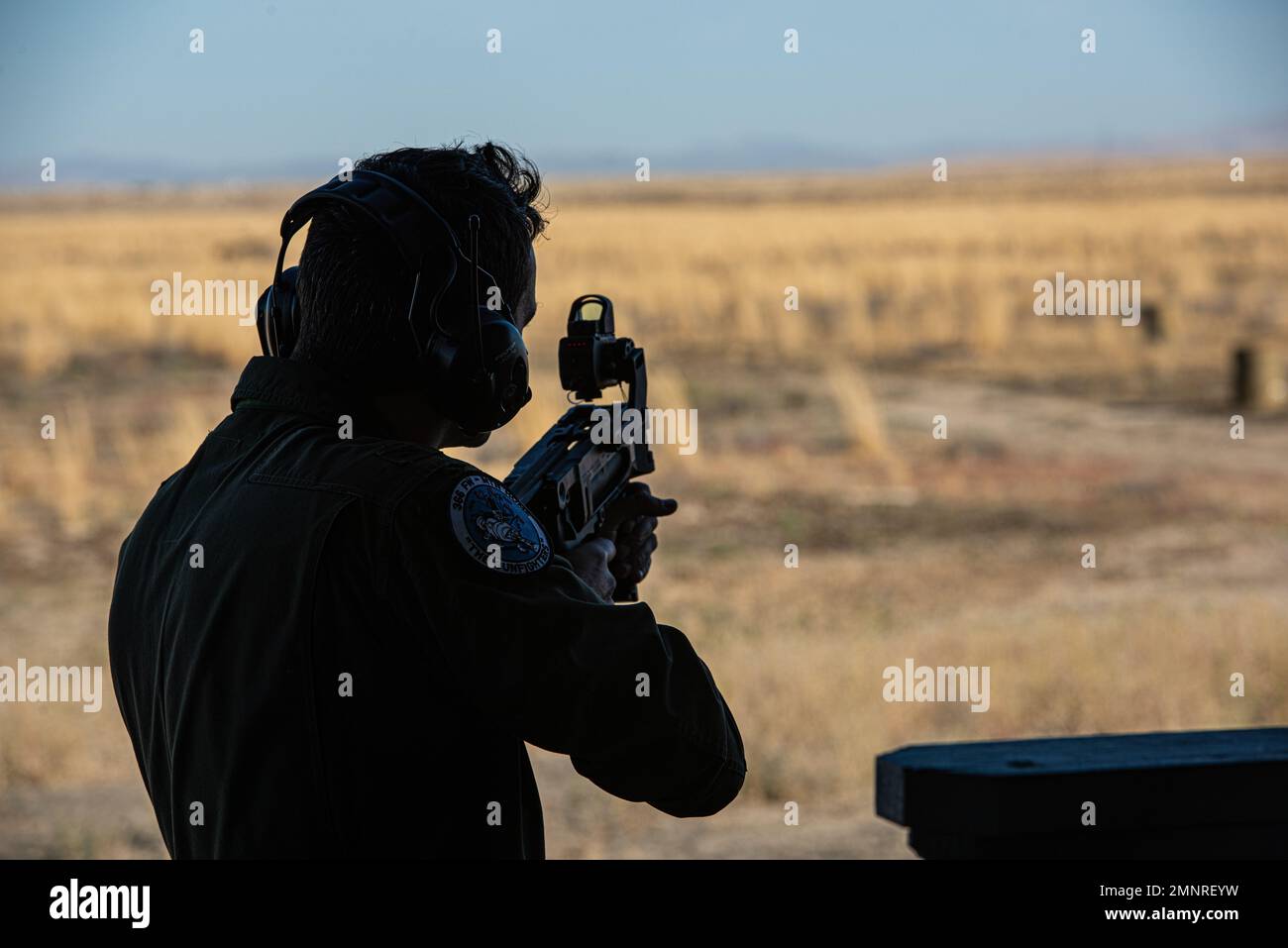 Col. Isaac T. Bell, 366th Fighter Wing Deputy commander, fires a M320 ...