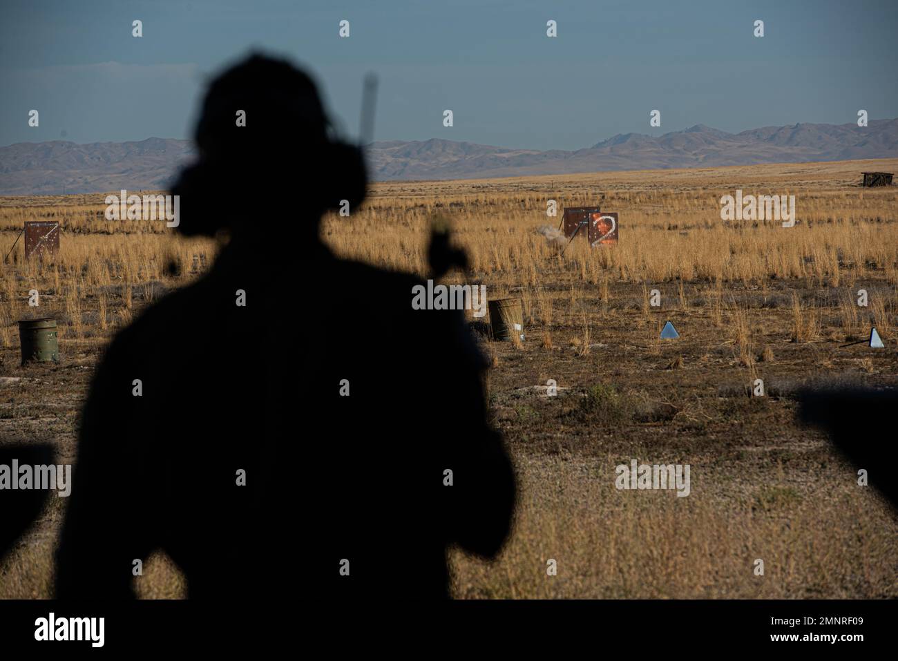 Col. Isaac T. Bell, 366th Fighter Wing Deputy commander, fires a M320 ...