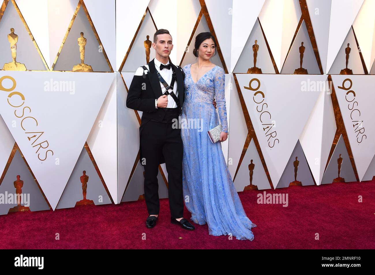 Adam Rippon, left, and Mirai Nagasu arrive at the Oscars on Sunday ...