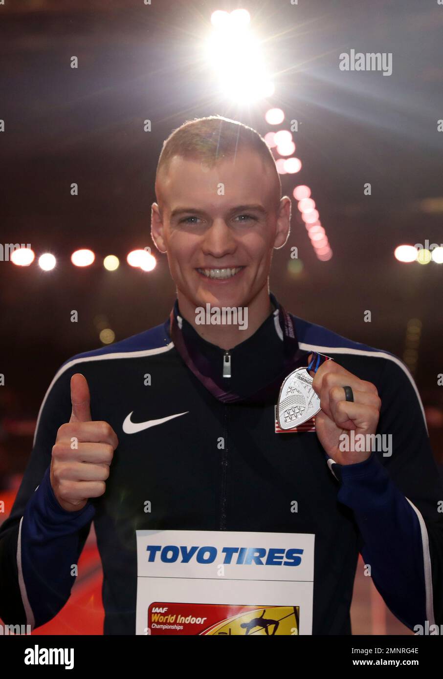 United States' Sam Kendricks shows off his silver medal after the ...