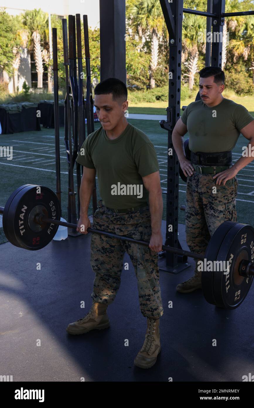 U.S. Marine Corps Cpl. Julio Gomez Jr., left, administrative specialist ...