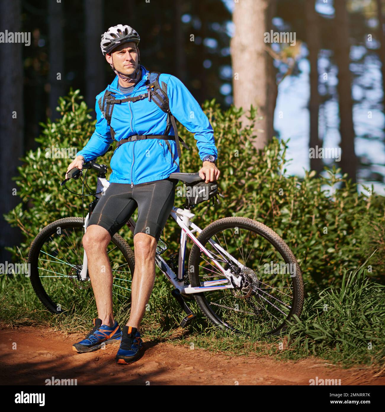 Live to ride, ride to live. a male cyclist out for a ride on his ...