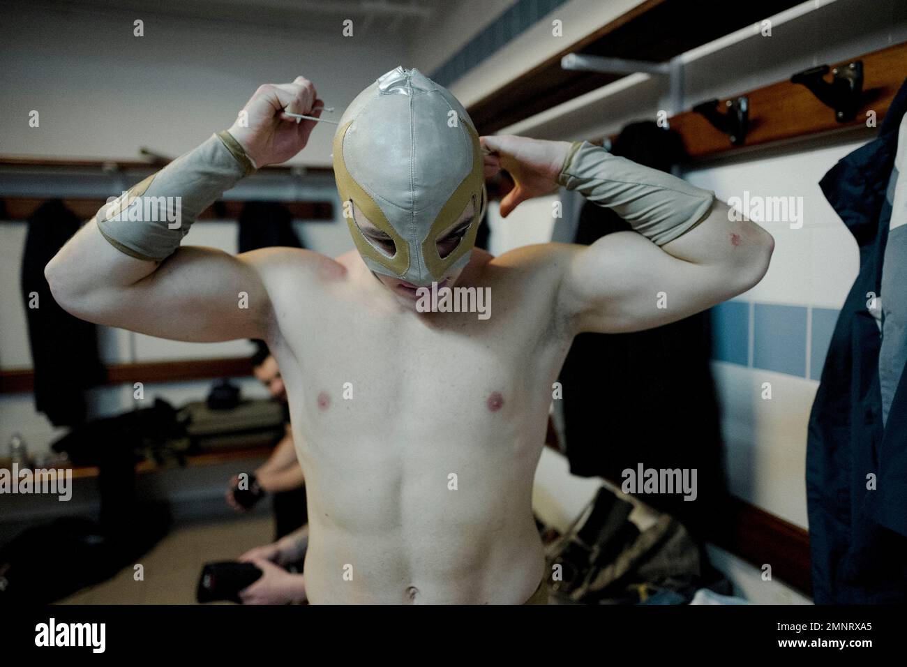 In this photo dated Saturday, Feb. 24, 2018, wrestler Ace Angel ties ...