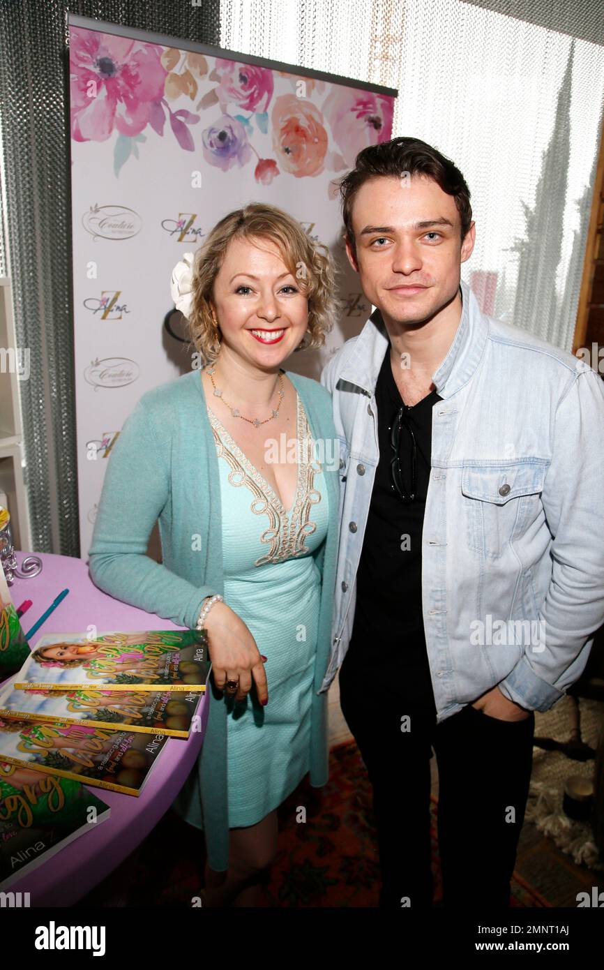 Thomas Doherty, right, poses with Chef Alina Z at Day 2 of the Kari ...
