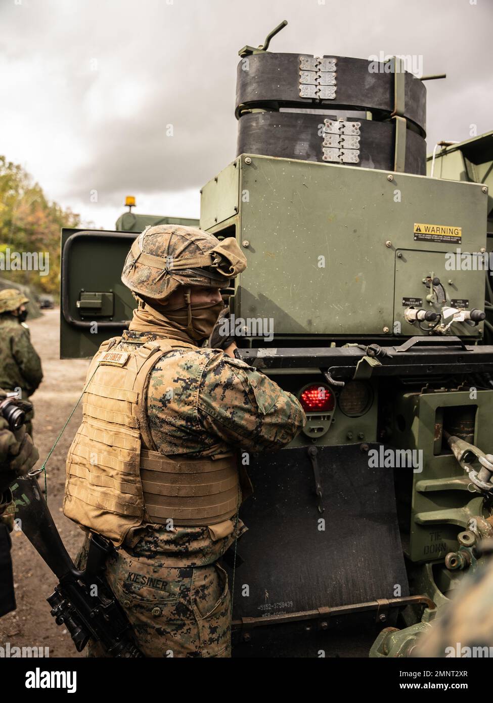 U.S. Marine Corps Lance Cpl. Ethan Kiesiner, a wrecker operator with ...