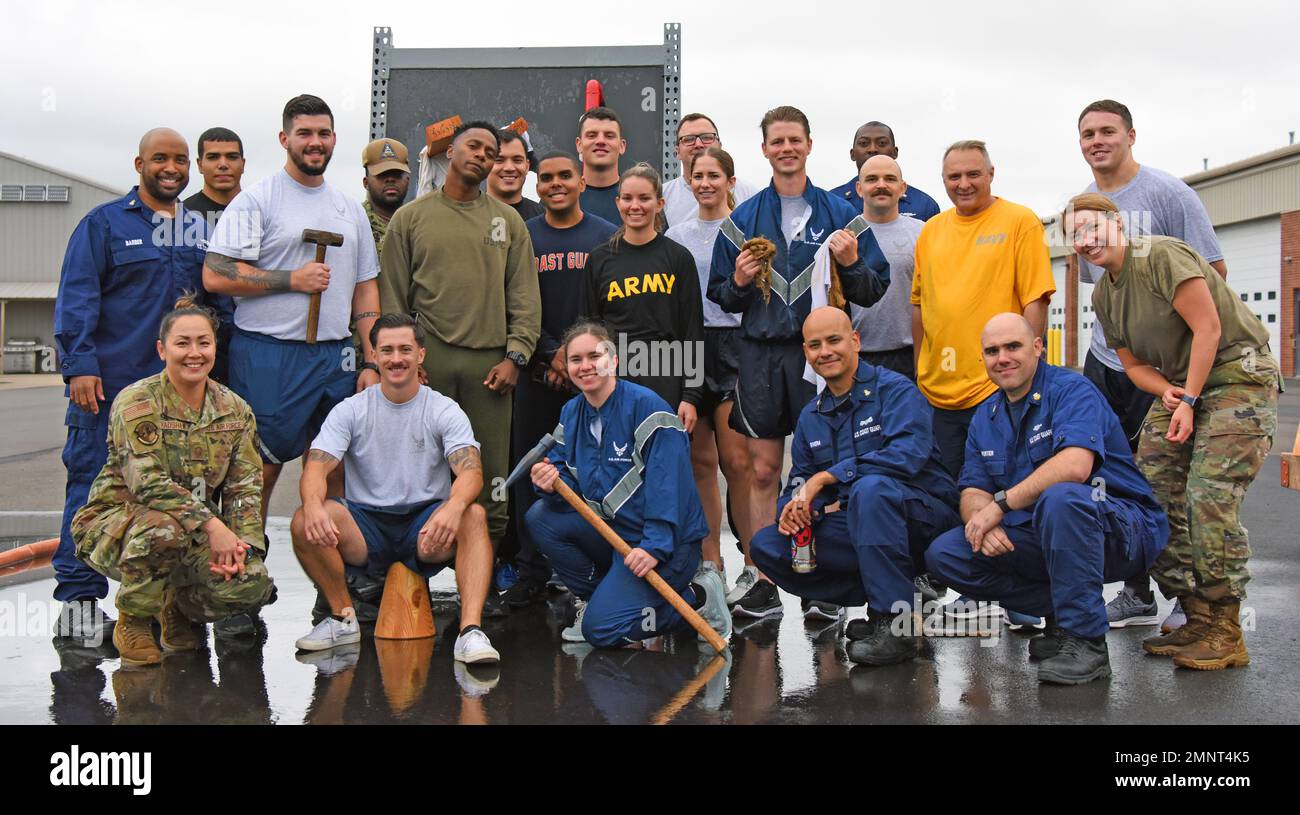 Students and class instructors pose for a picture after completing the ...