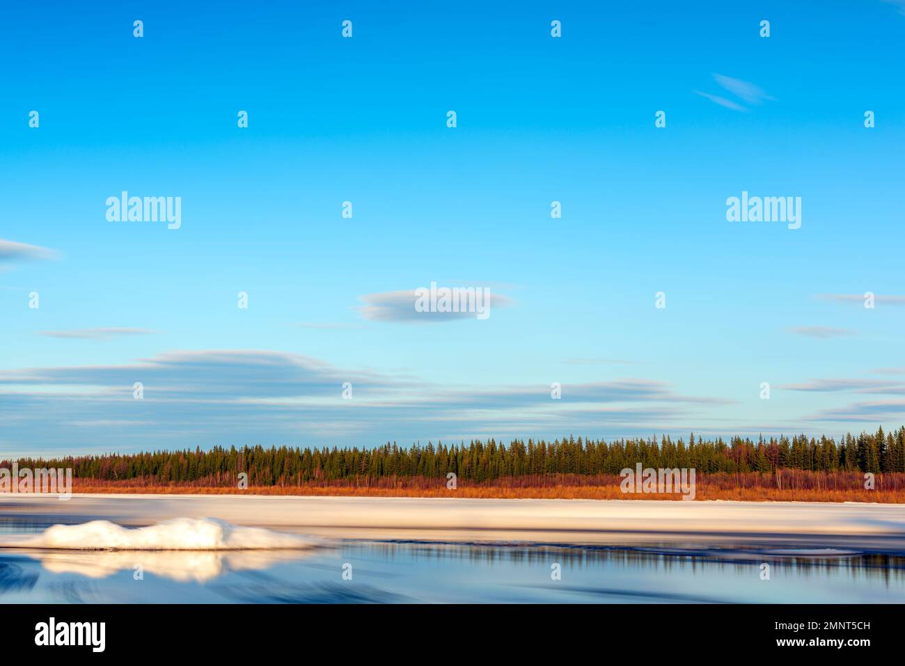 The remains of the last spring ice on the Vilyui River in Yakutia float ...