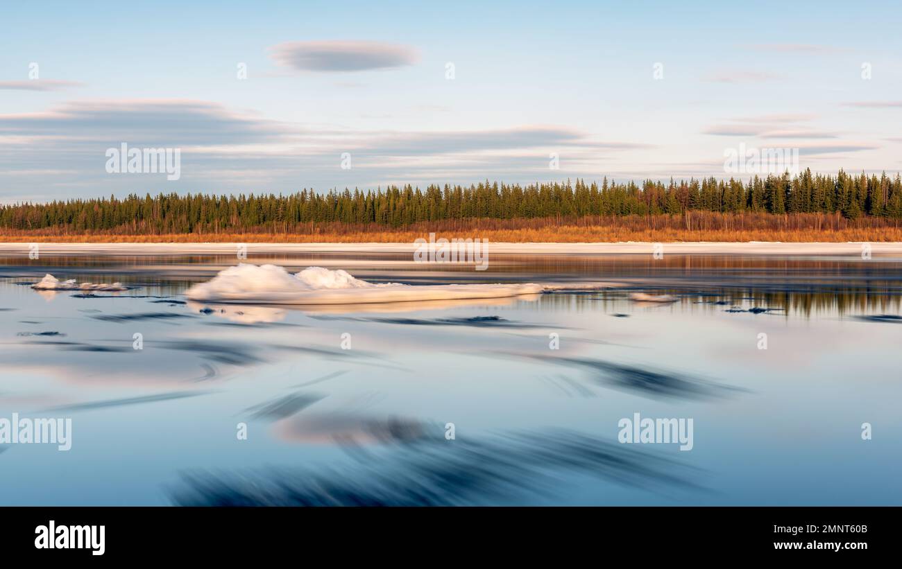 Spring ice floats against the background of the movement of the flow of ...
