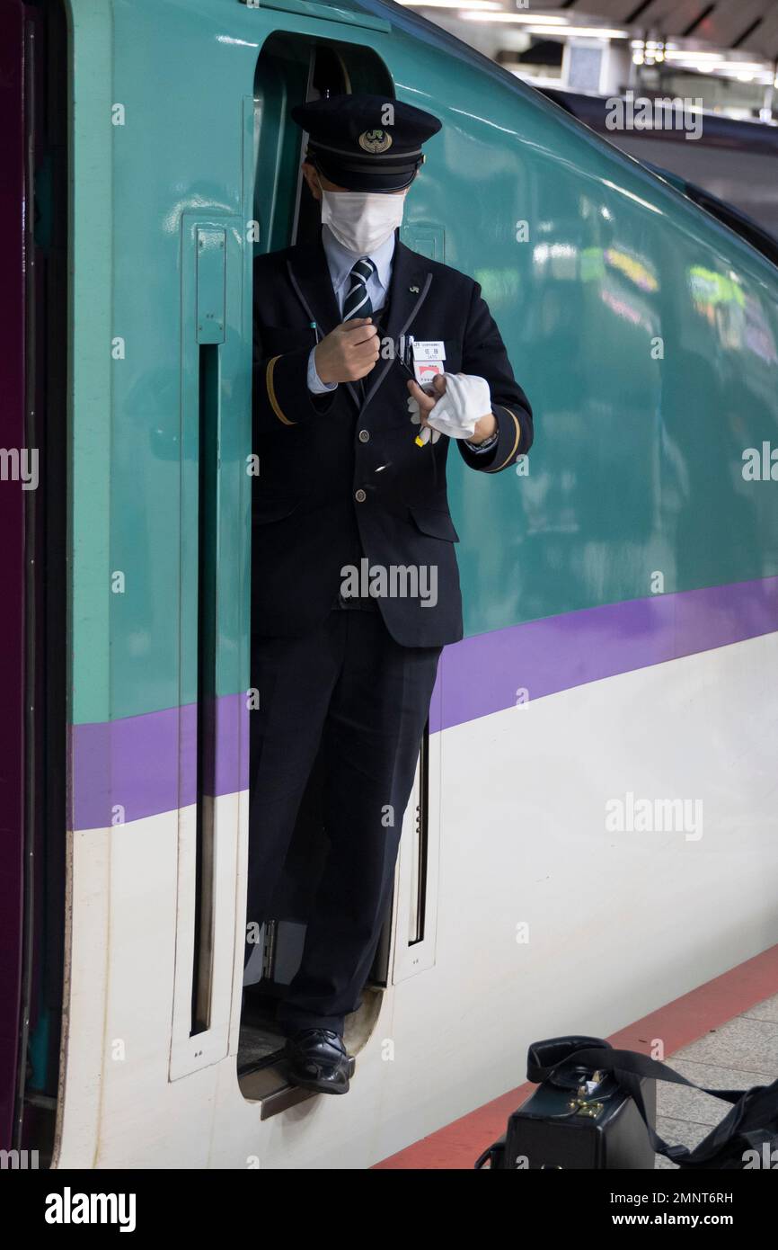 Tokyo, Japan. 27th Jan, 2023. JR East crew members prepare a E5 series ...
