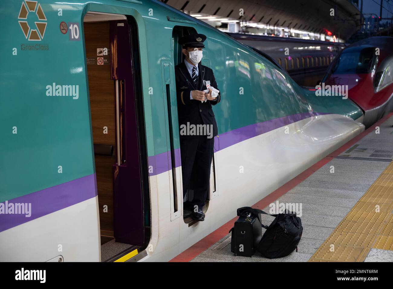 Tokyo, Japan. 27th Jan, 2023. JR East crew members prepare a E5 series ...