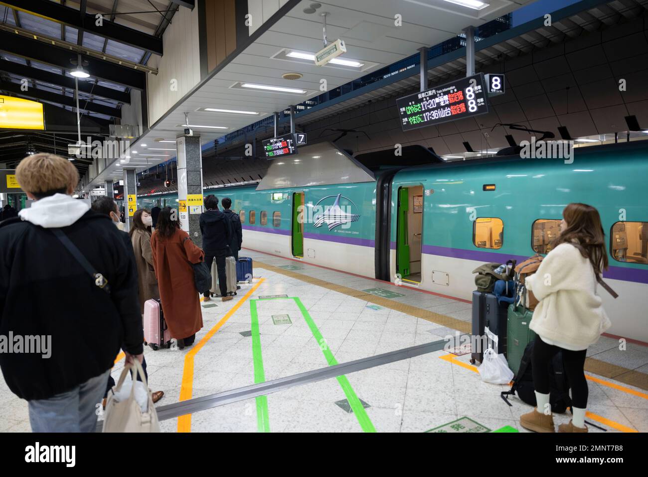 Tokyo, Japan. 27th Jan, 2023. Passengers wait for cleaning to complete ...