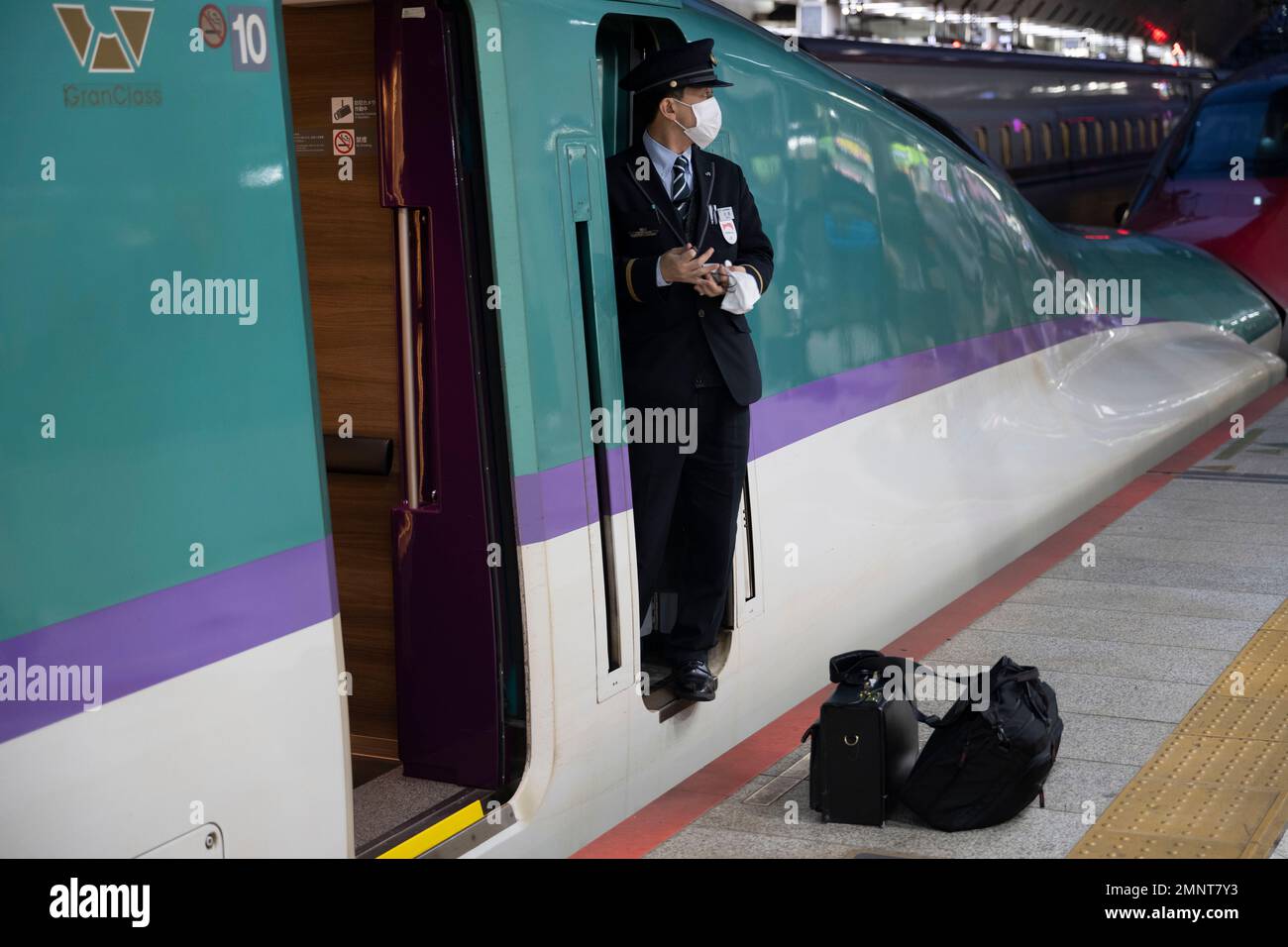 Tokyo, Japan. 27th Jan, 2023. JR East crew members prepare a E5 series ...