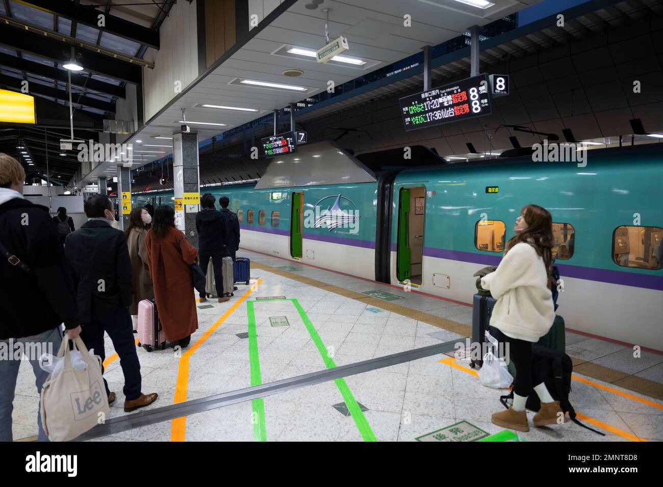 Tokyo, Japan. 27th Jan, 2023. Passengers wait for cleaning to complete ...