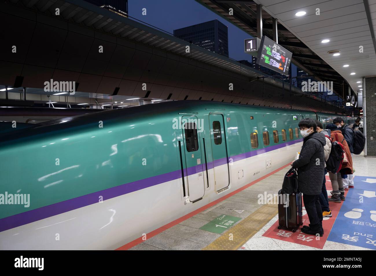 Tokyo, Japan. 27th Jan, 2023. Passengers wait for cleaning to complete ...