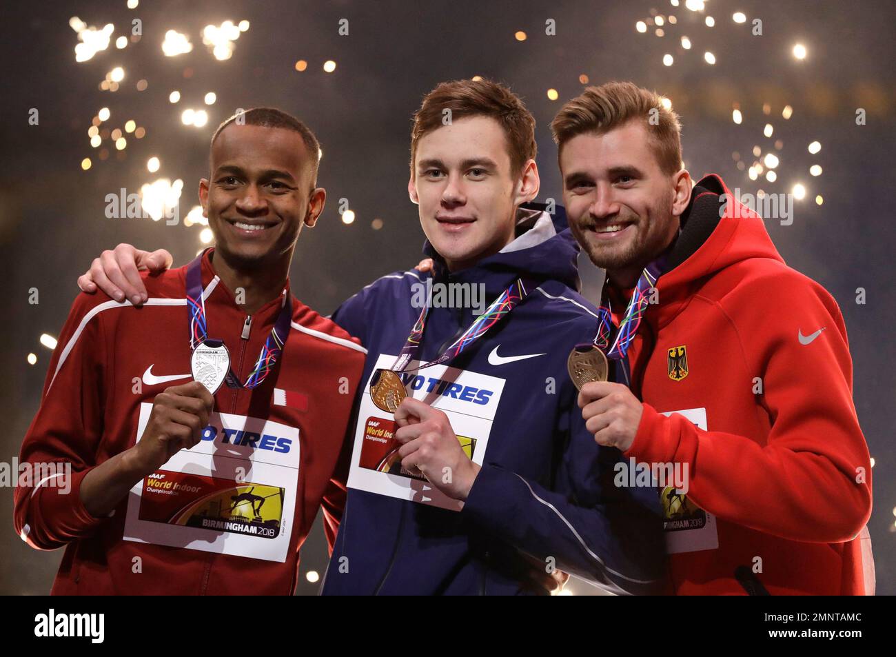 Russia's gold medal winner Danil Lysenko is flanked by Qatar's silver ...