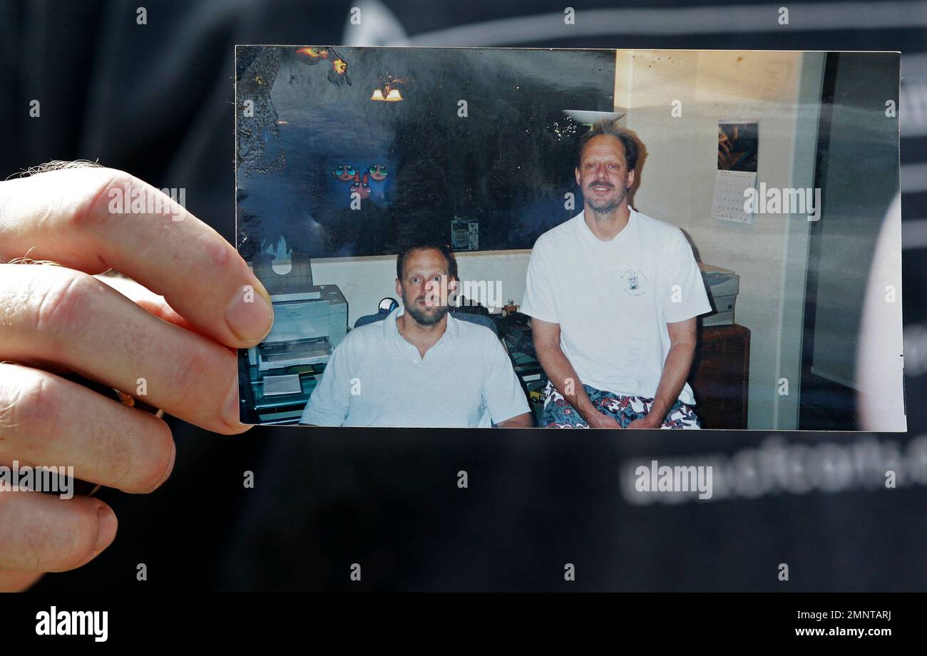 FILE - In this Oct. 2, 2017 file photo, Eric Paddock holds a photo of ...