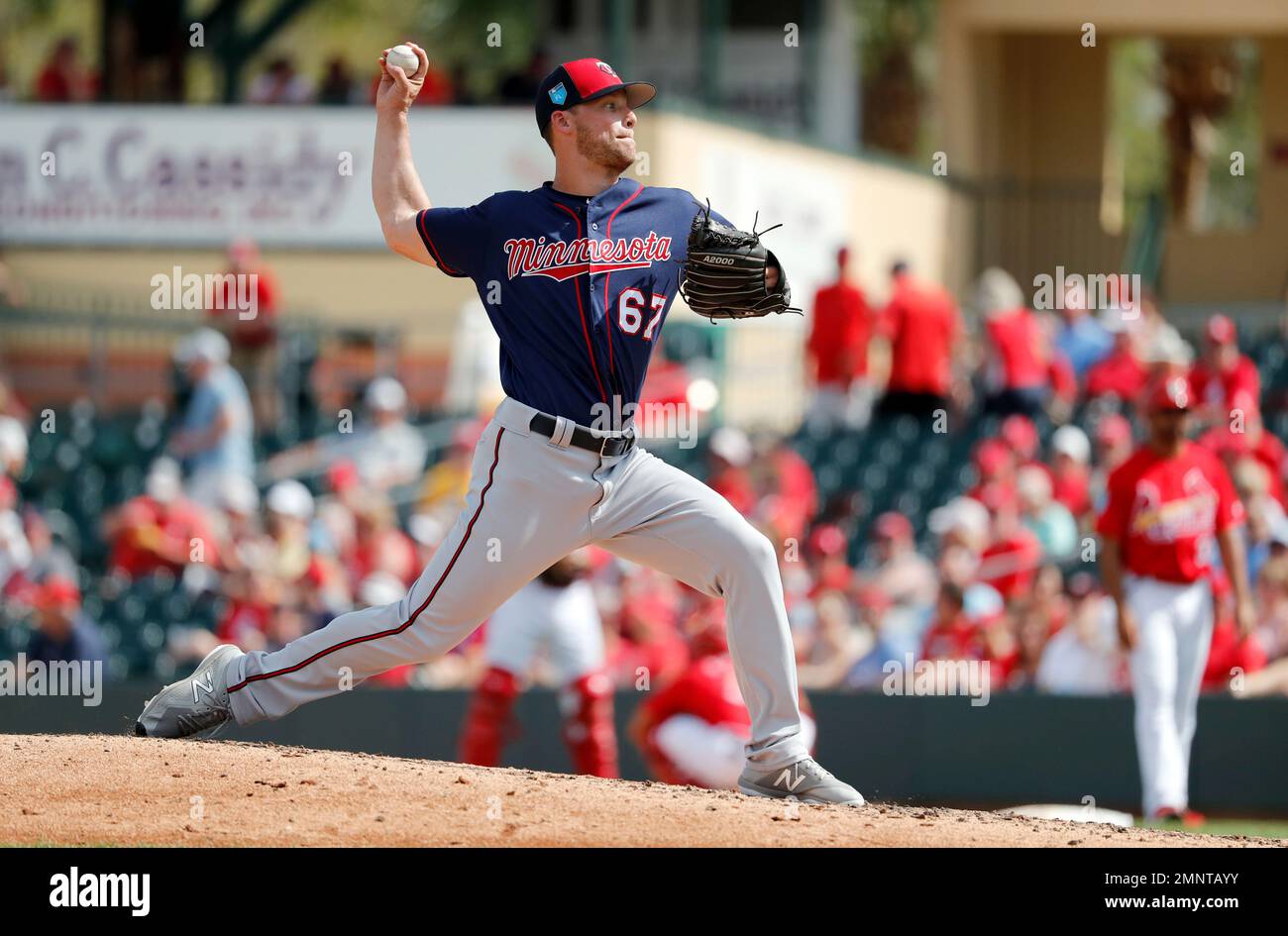 Minnesota Twins pitcher Alan Busenitz throws during the fourth inning ...