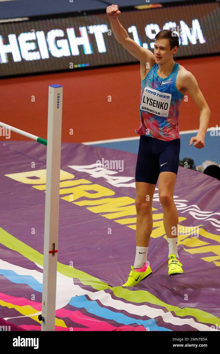 Russia's Danil Lysenko celebrates after clearing the bar in the men's ...