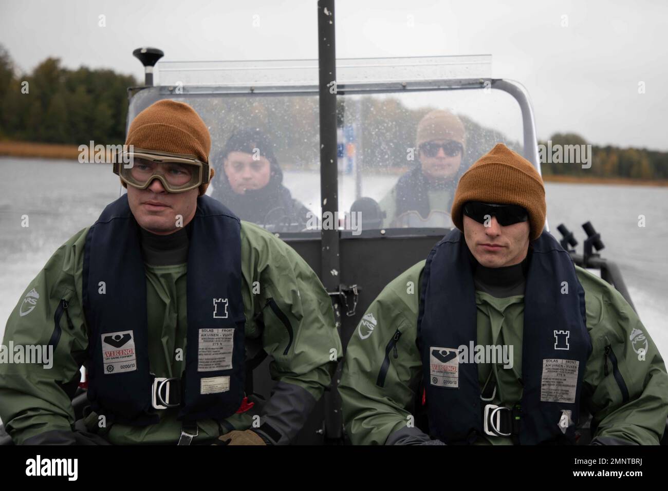 U.S. Marines Staff Sgt. Kamoryn Rogers (left), a motor transport ...