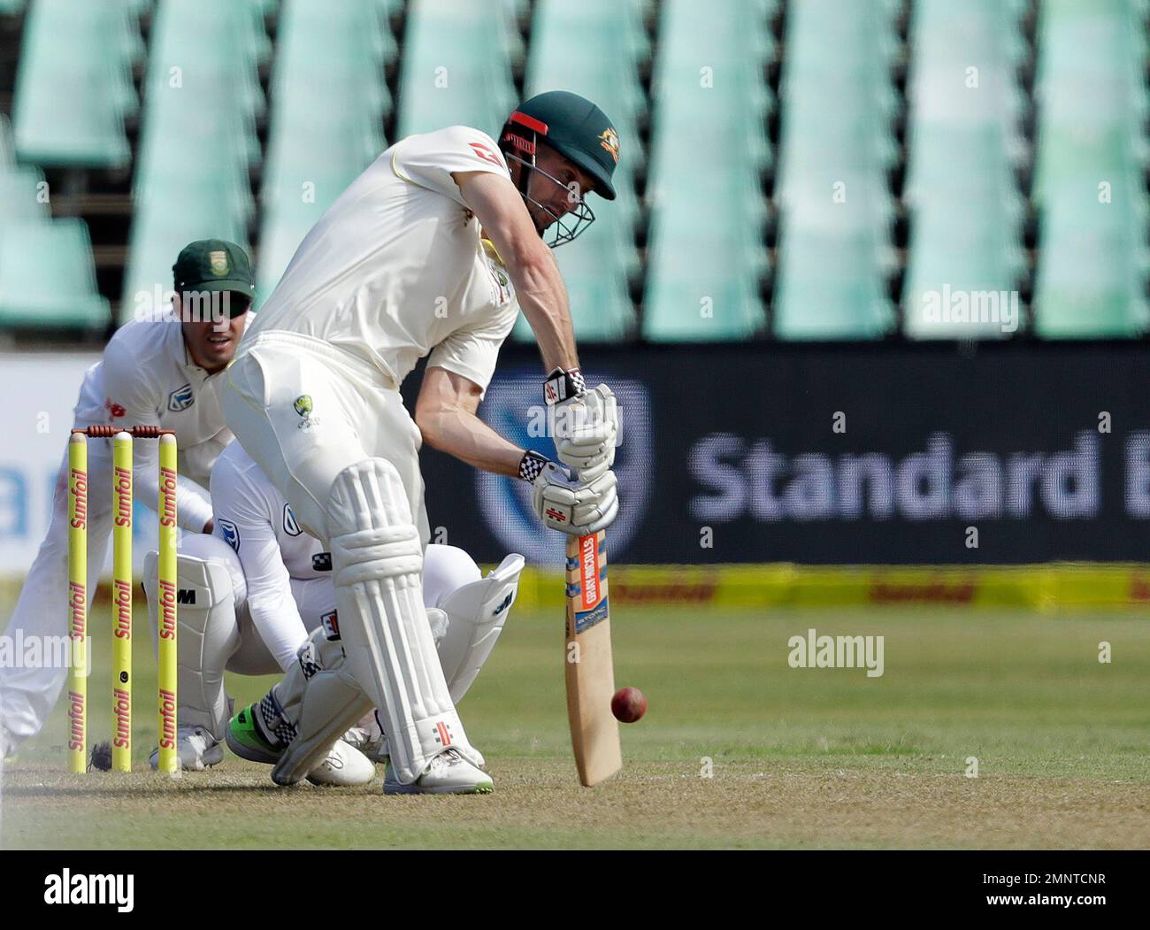 Australia's batsman Shaun Marsh, right, plays a shot as South Africa's ...