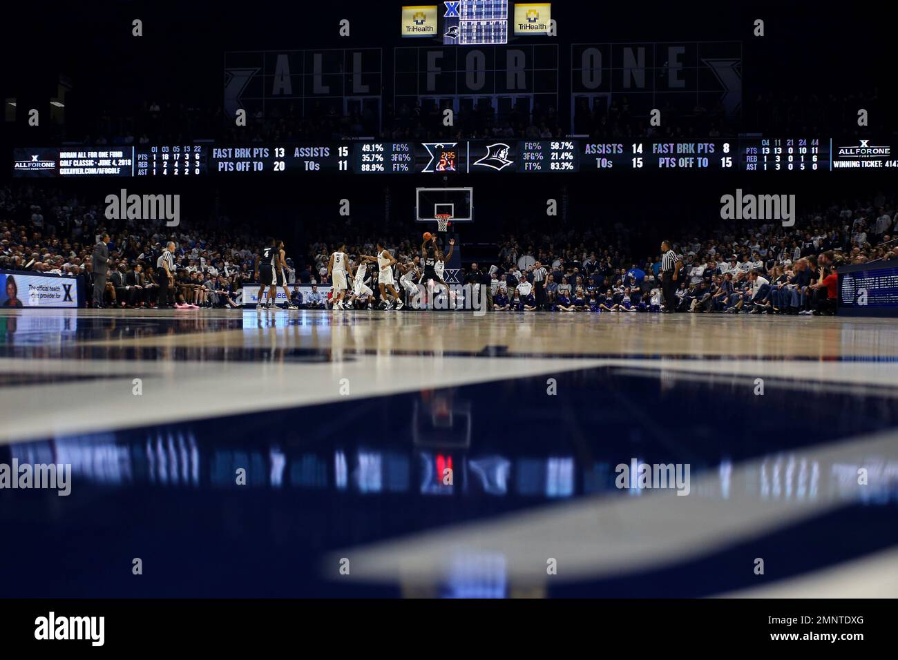 Providence's Kyron Cartwright drives to the basket against Xavier's ...