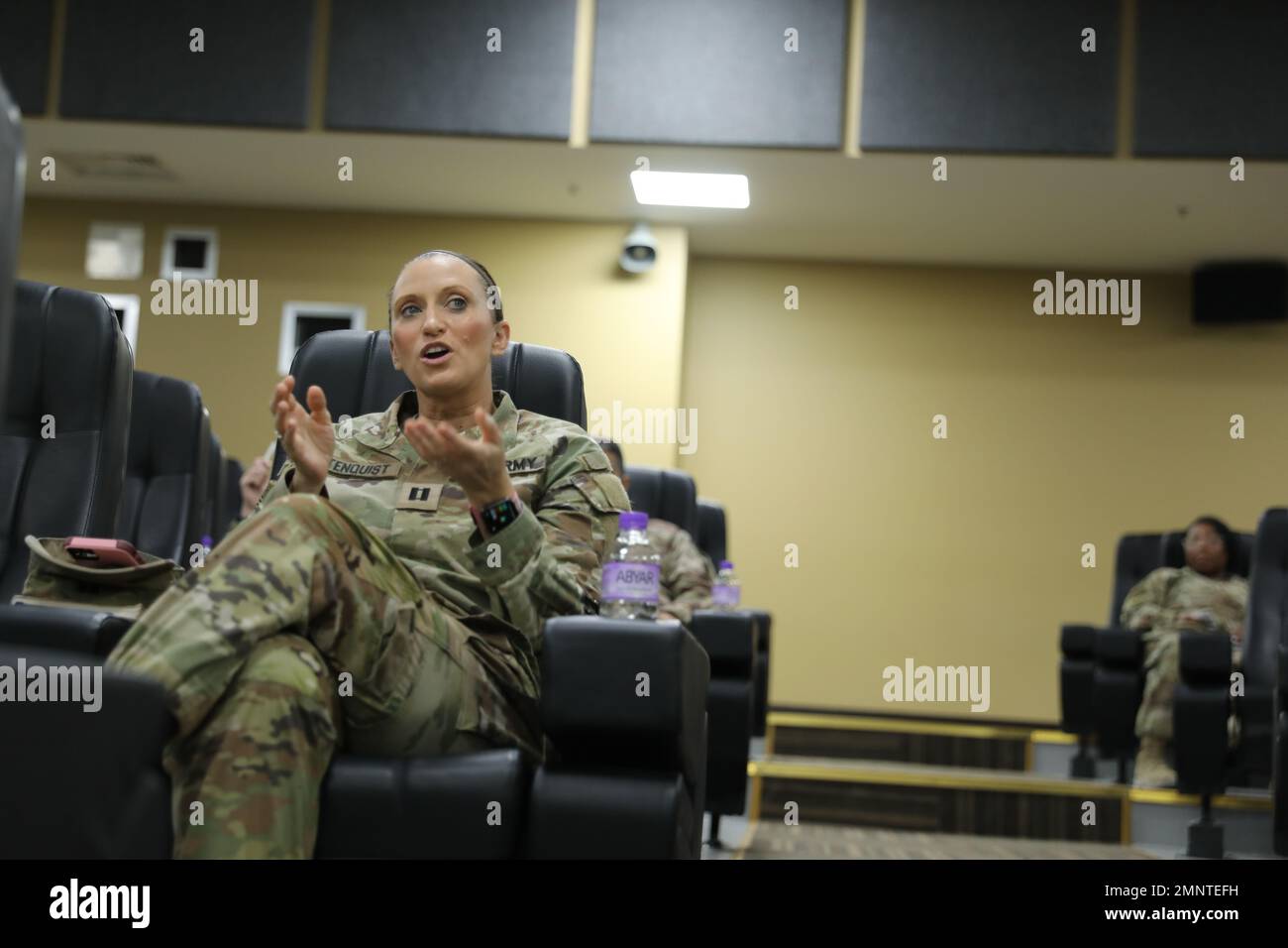 Capt. Melissa Stenquist, 35th Infantry Division, answers a question ...