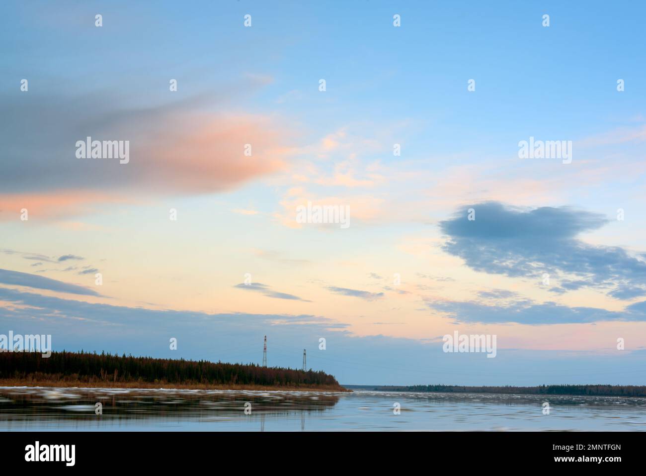 The remains of the last spring ice on the Vilyui River in Yakutia float ...