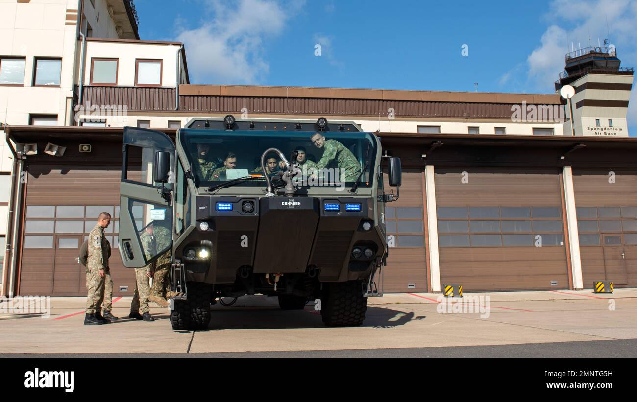 Airmen with the 52nd Civil Engineer Squadron fire department, provide a ...
