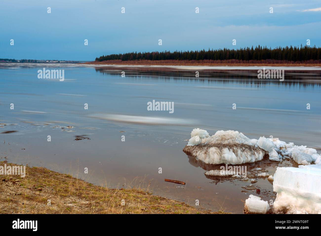 The remains of the last spring ice on the Vilyui River in Yakutia float ...