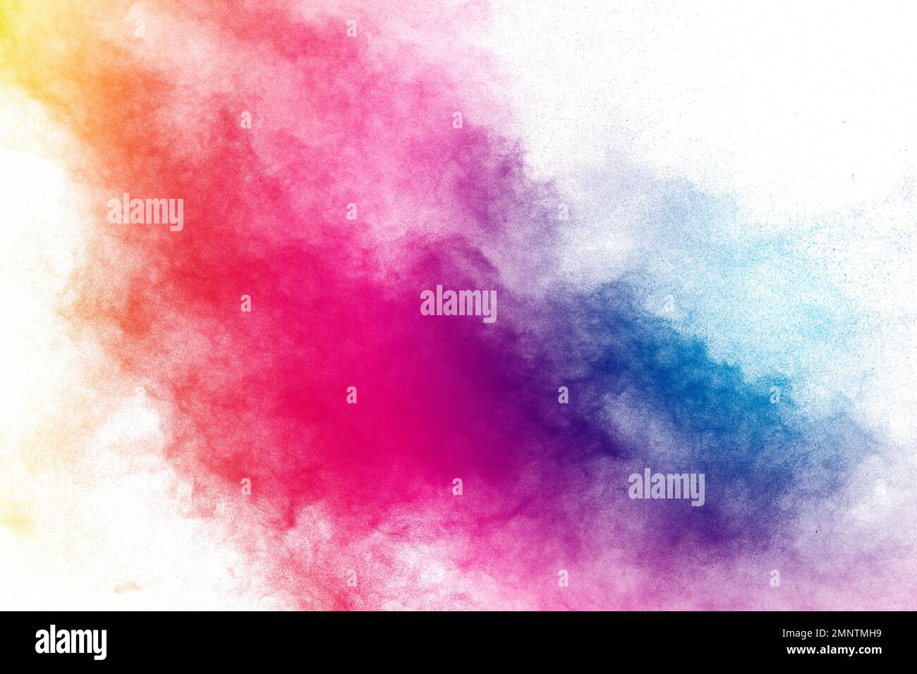 Freeze motion of color powder exploding on white background Stock Photo ...