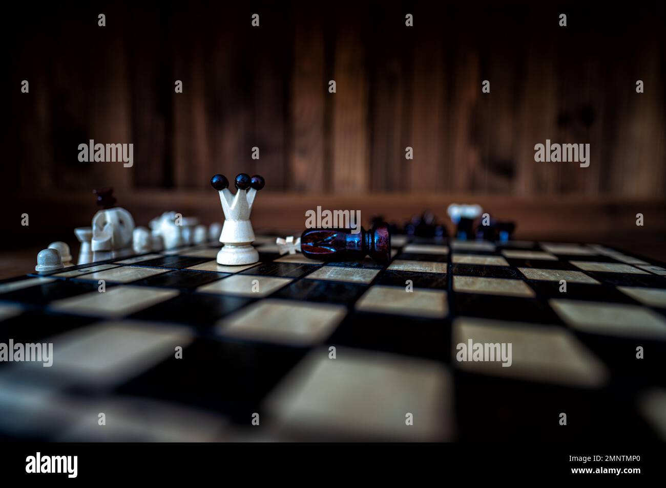 Blurred background with a low depth of focus. The set of wooden chess ...