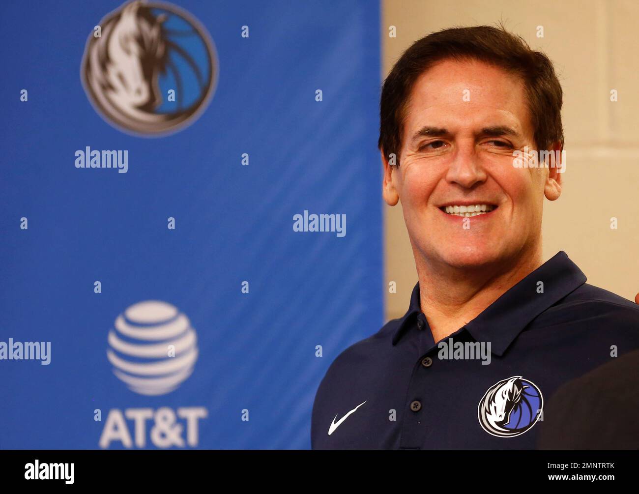 Dallas Mavericks owner Mark Cuban stands on stage before a press ...