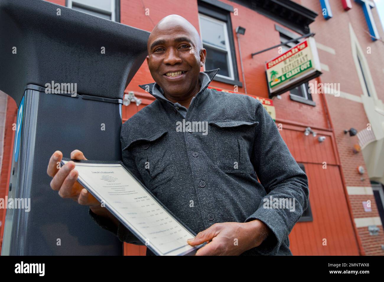In this Wednesday, Jan. 24, 2018, photo, Amara Sumah, owner of Sumah's ...