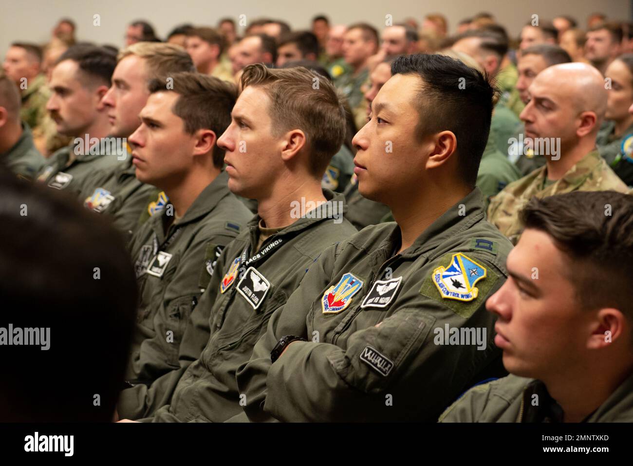 Exercise participants attend a Red Flag-Alaska 23-1 welcome briefing at ...