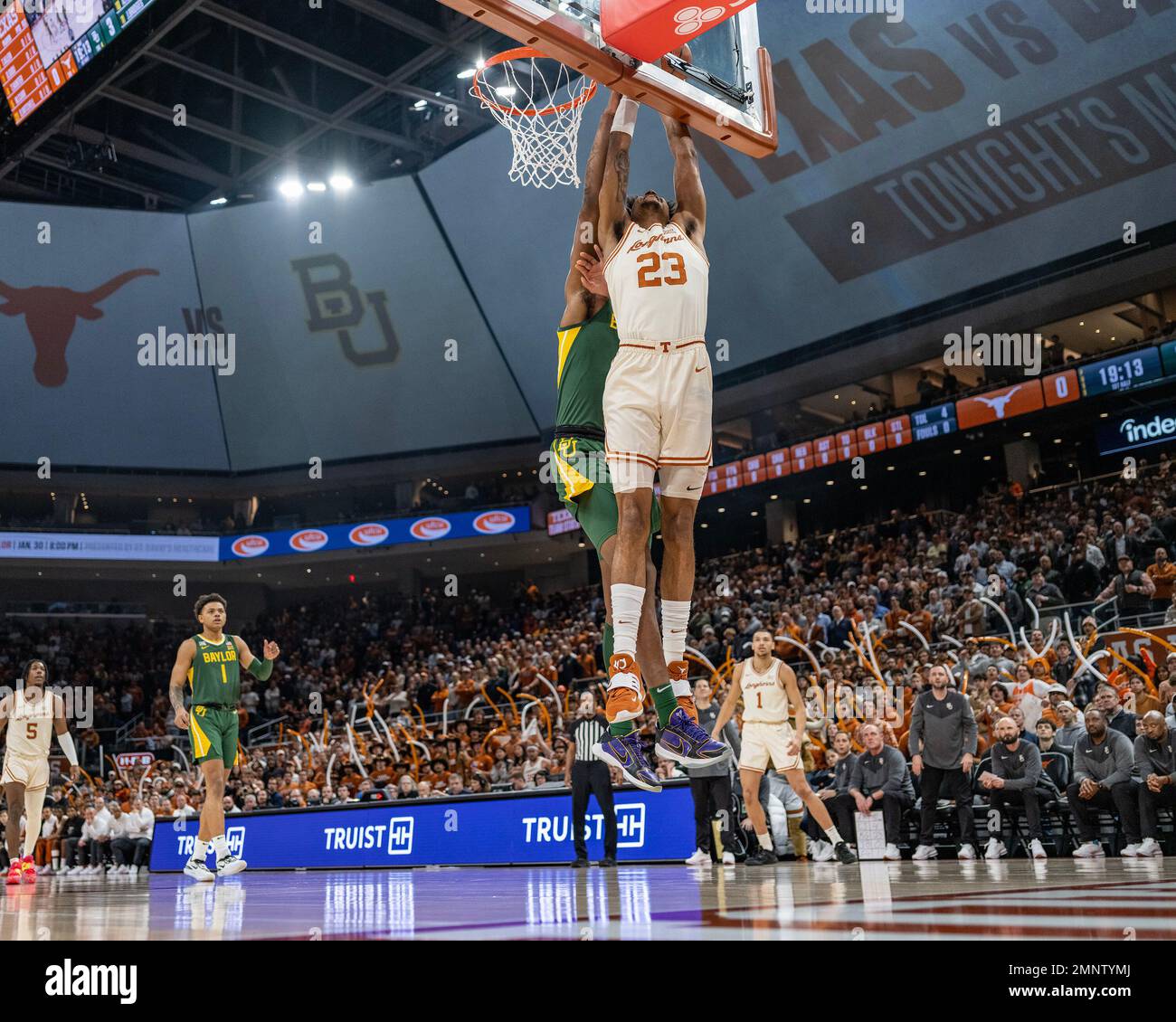 Jan 30, 2023. Dillon Mitchell #23 of the Texas Longhorns in action vs ...