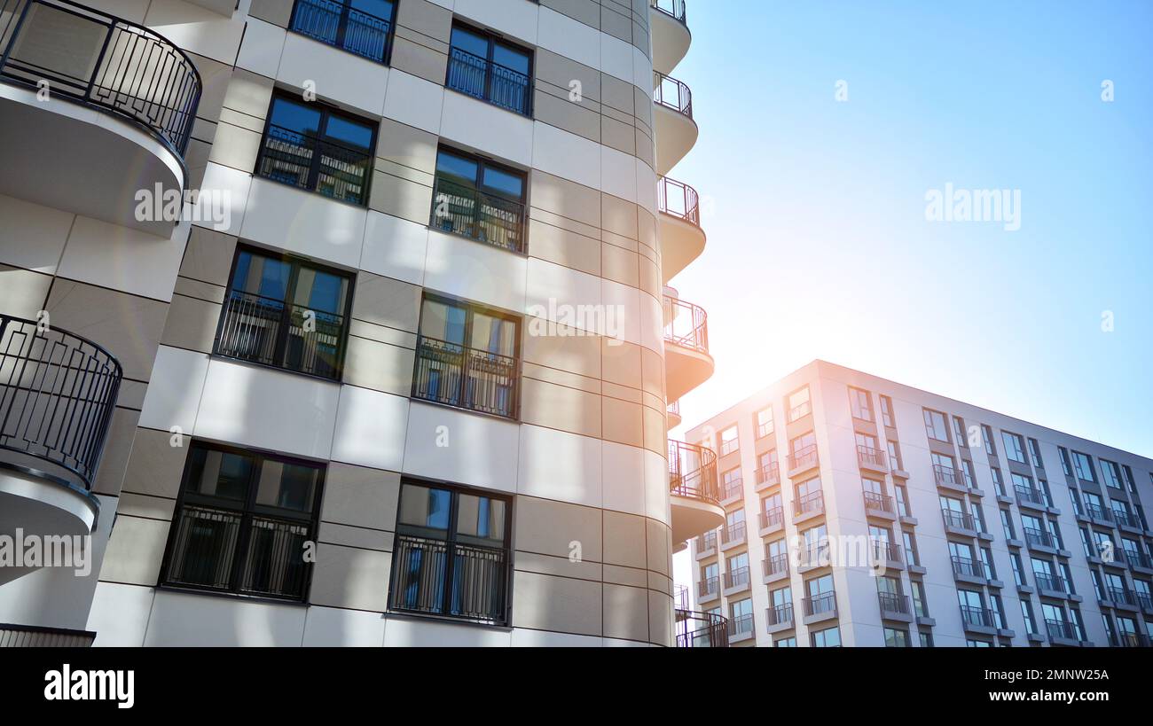 Futuristic square architecture of apartment building. Real estate with ...