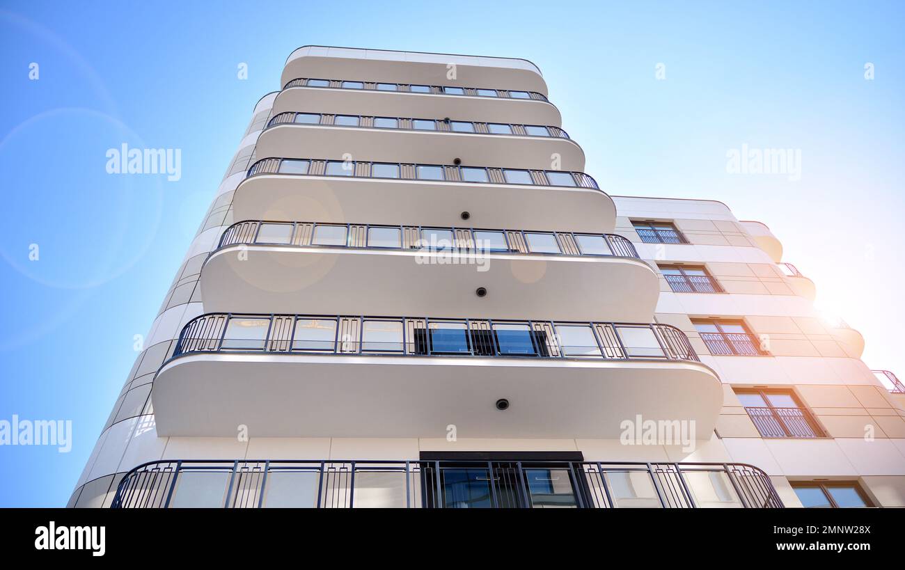 Futuristic square architecture of apartment building. Real estate with ...