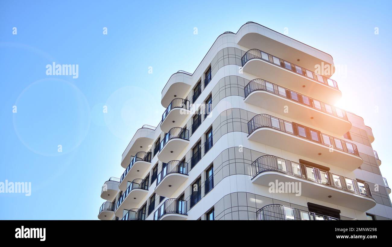Futuristic square architecture of apartment building. Real estate with ...