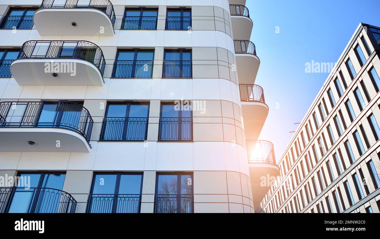 Futuristic square architecture of apartment building. Real estate with ...