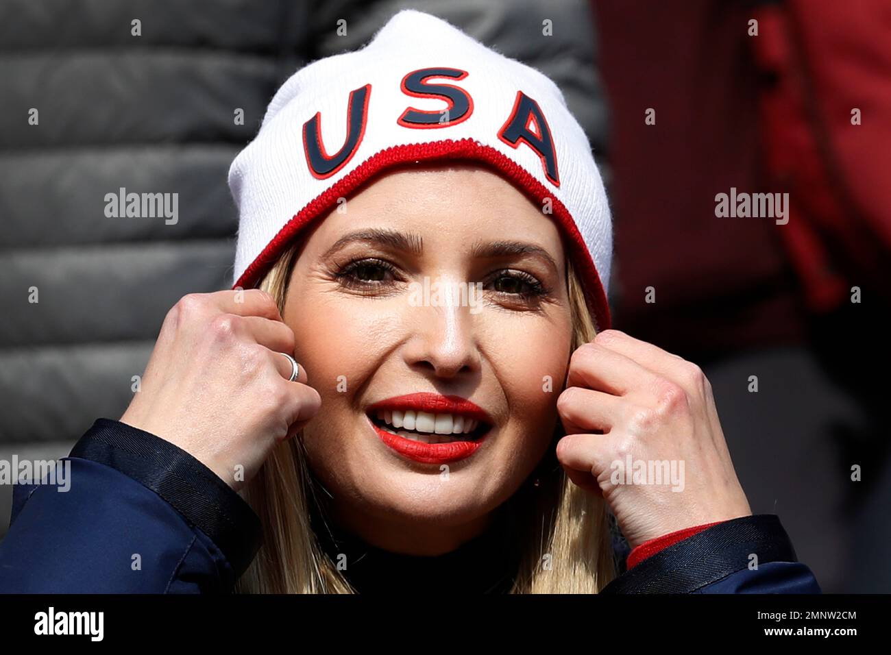 Ivanka Trump adjusts her hair as she watches the four-man bobsled ...