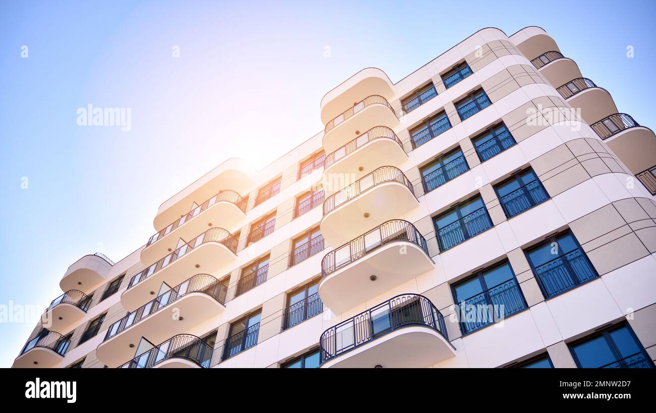 Futuristic square architecture of apartment building. Real estate with ...