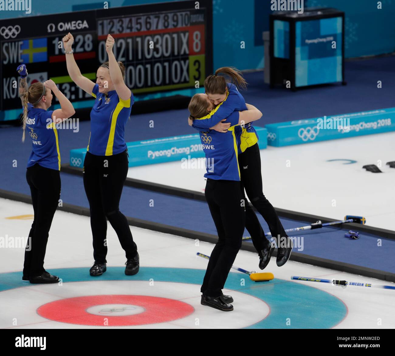 Sweden celebrates after winning the gold medal in their women's curling ...