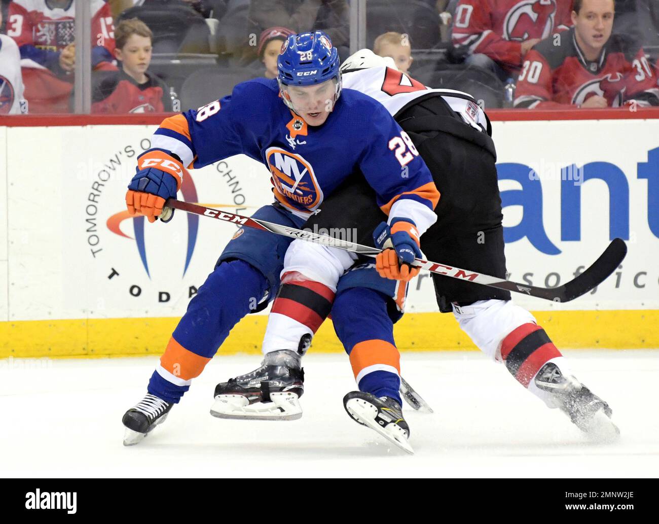 New York Islanders defenseman Sebastian Aho (28) collides with New ...