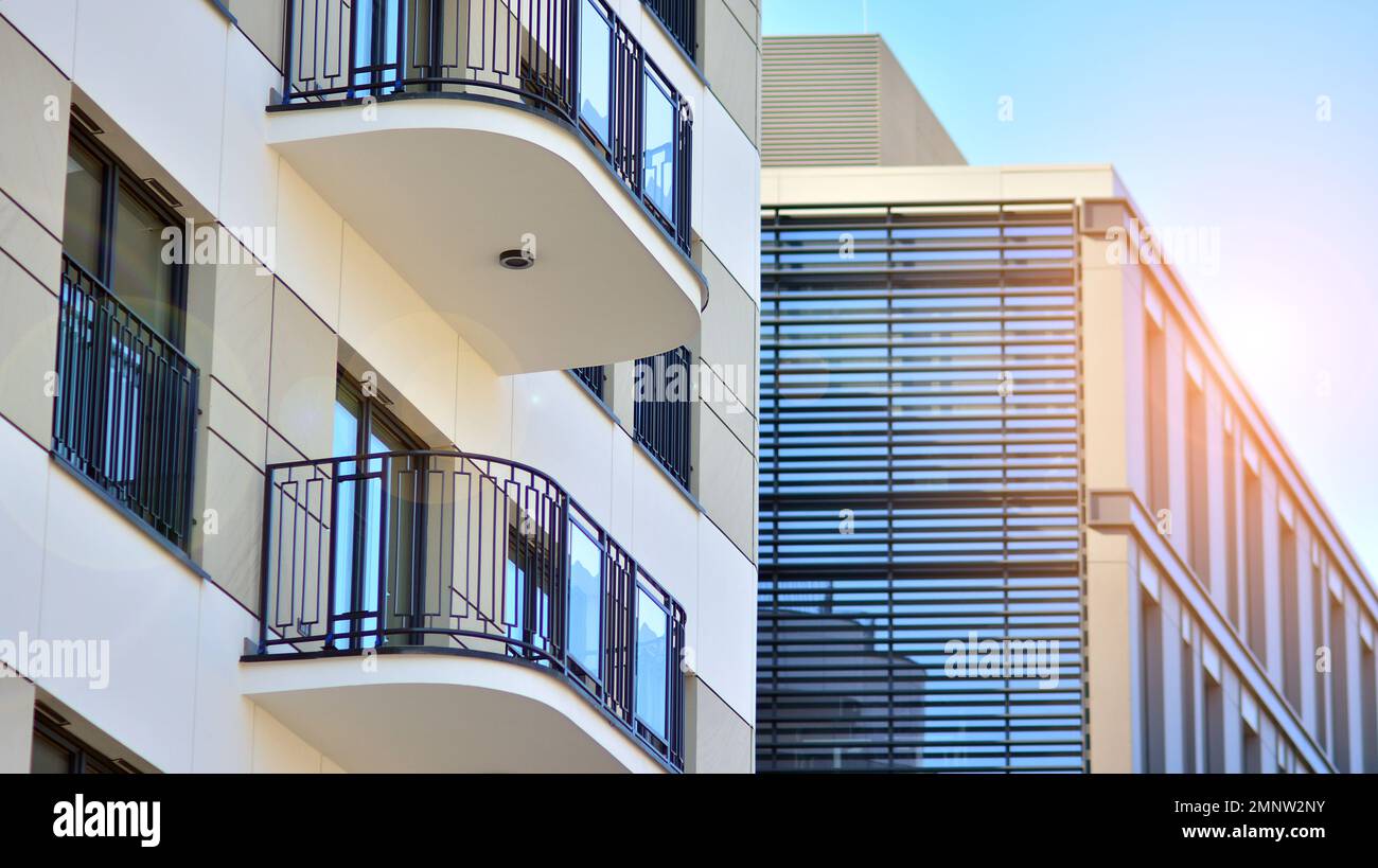 Futuristic square architecture of apartment building. Real estate with ...
