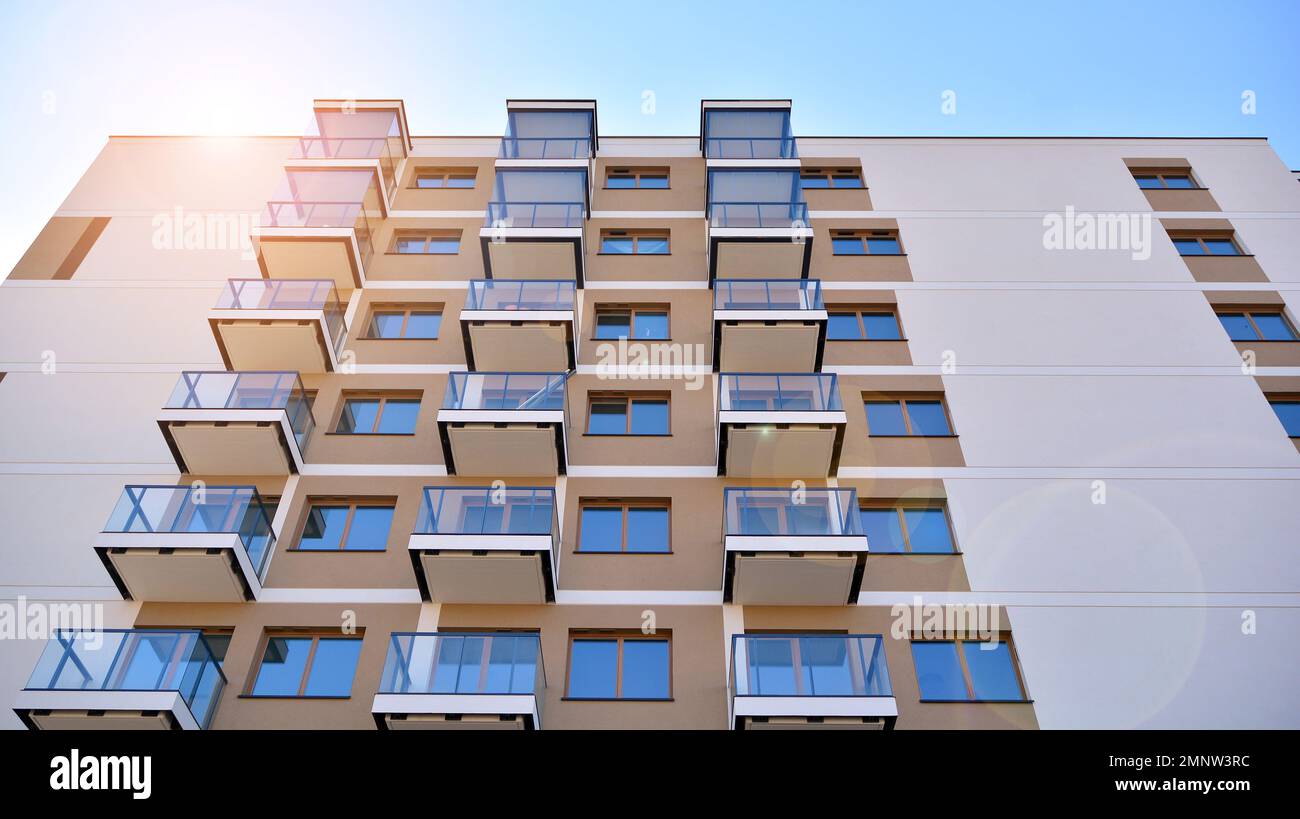 Futuristic square architecture of apartment building. Real estate with ...
