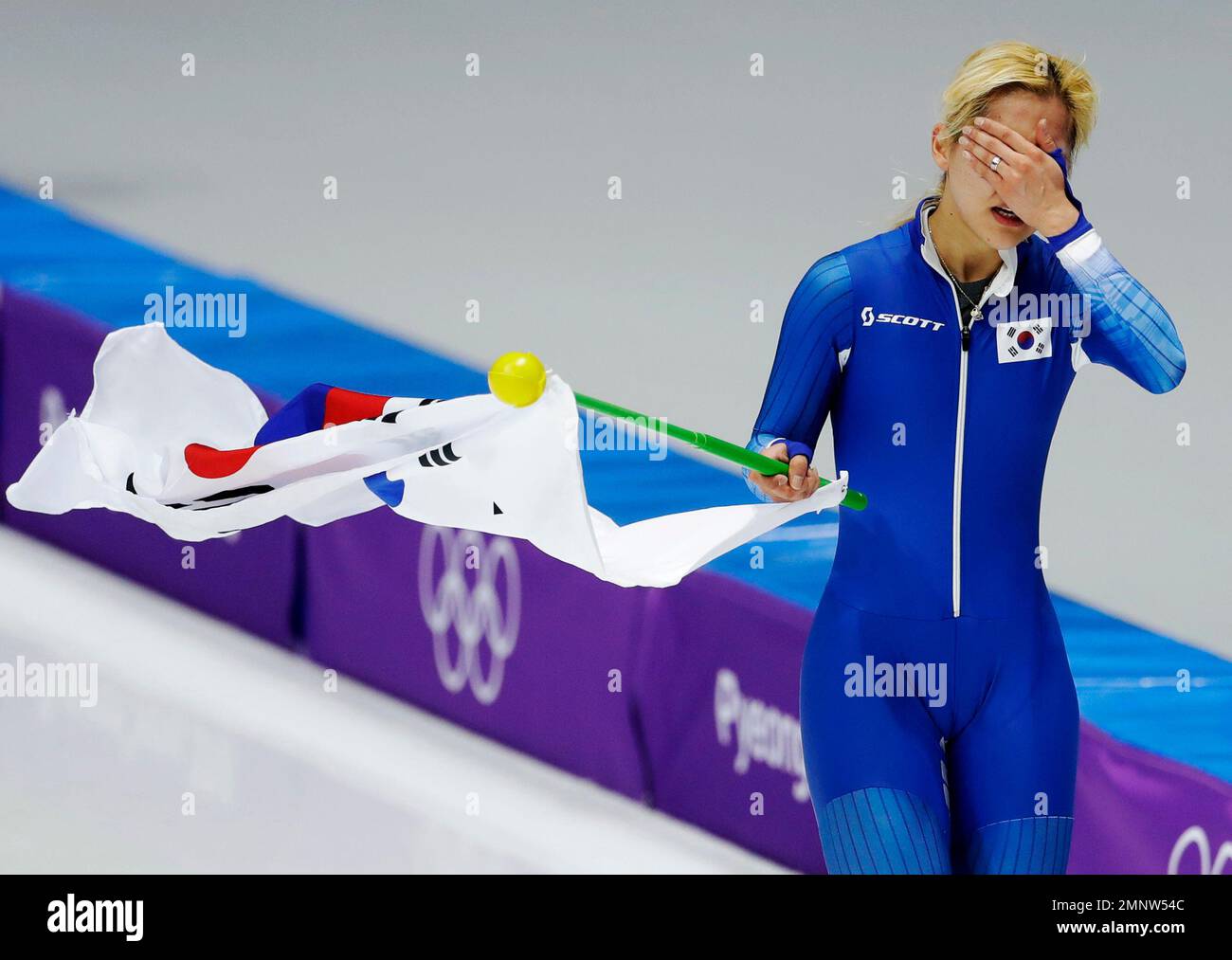 Silver medalist Kim Bo-reum of South Korea cries after the women's mass ...