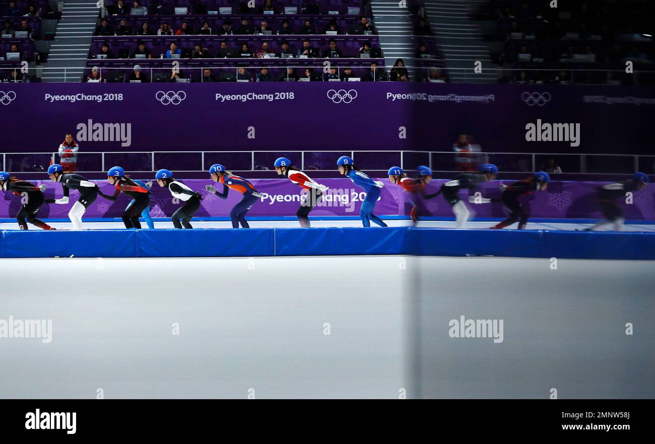 Athletes are reflected in a TV screen as the compete during the women's ...